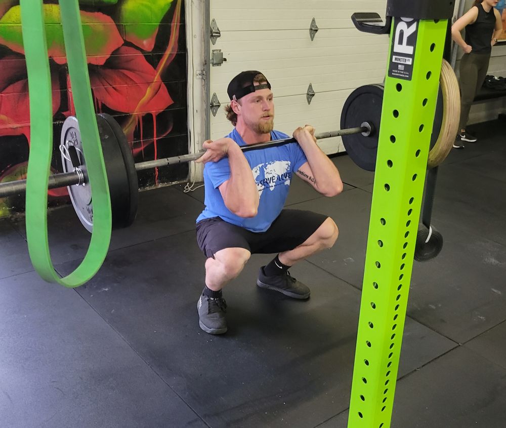 Why Do Coaches Cue High Elbows? - Machine Shed Fitness